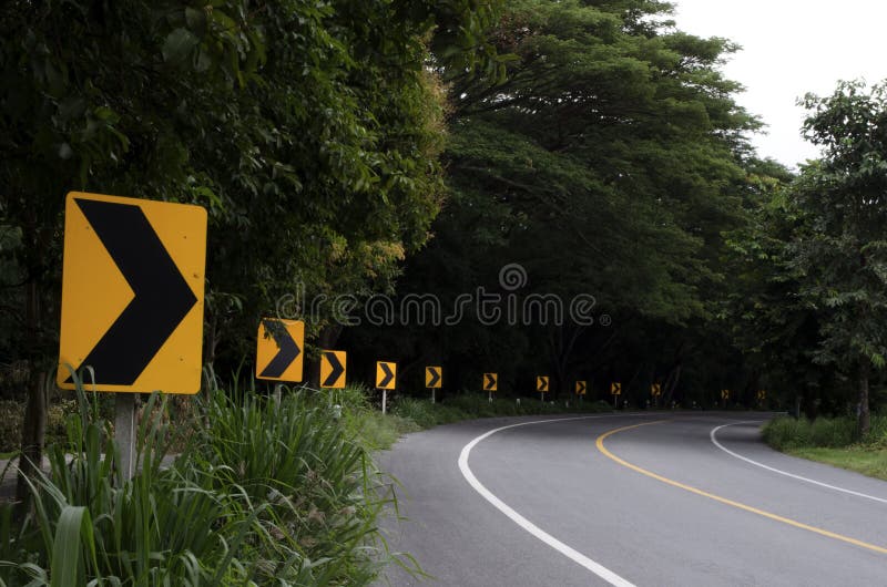Two Arrow Curve Signs stock photo. Image of safety, traffic - 36156882