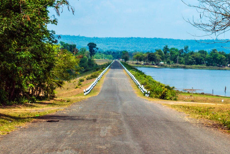 Road on the dam stock photo. Image of lush, beautiful - 91497340