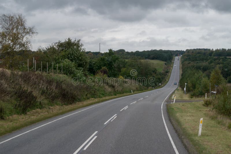 On the Road through Denmark Stock Photo - Image of cloudy, nature ...