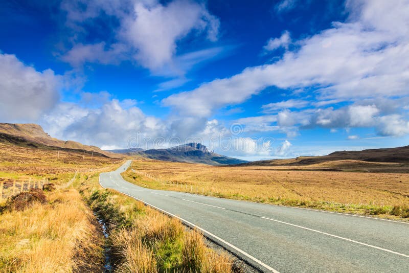 Road through a Desolate Landscape Stock Photo - Image of route ...