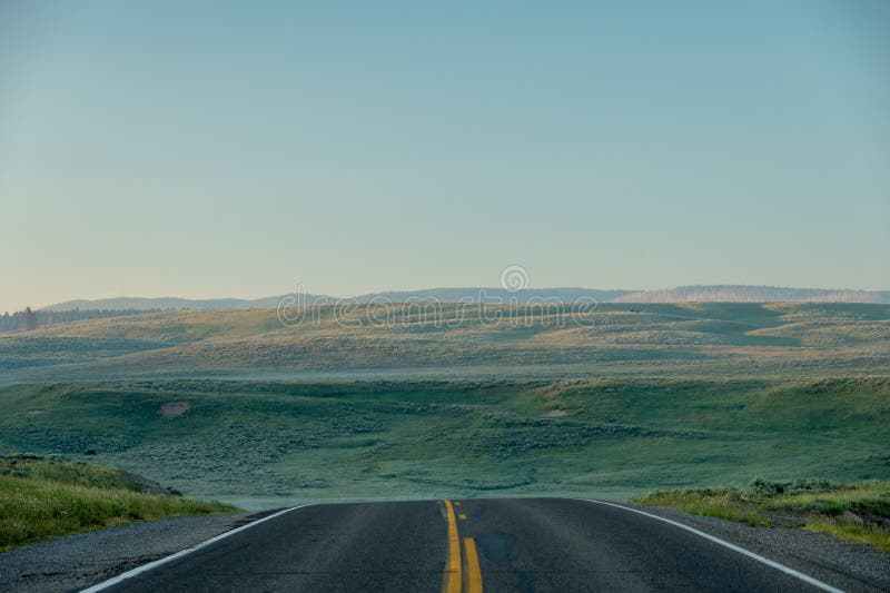 Road Disappears Over the Hill in Hayden Valley Stock Image - Image of ...