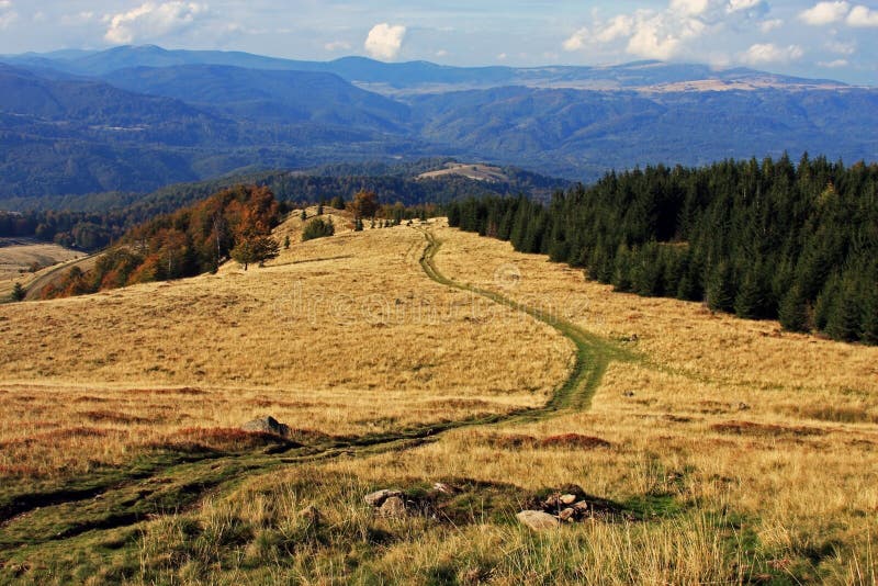 The road down the mountain stock photo. Image of hill - 45498468