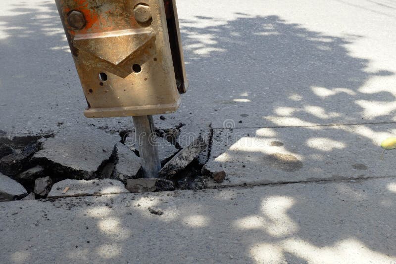 The Road Drilling Machine are Digging Road Surface. Stock Image - Image ...