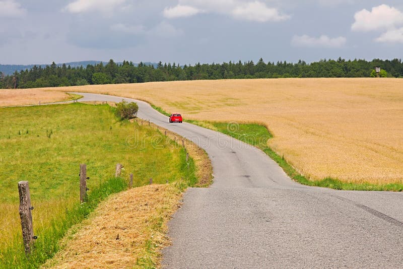 Road through farmlands stock image. Image of farming - 97696191
