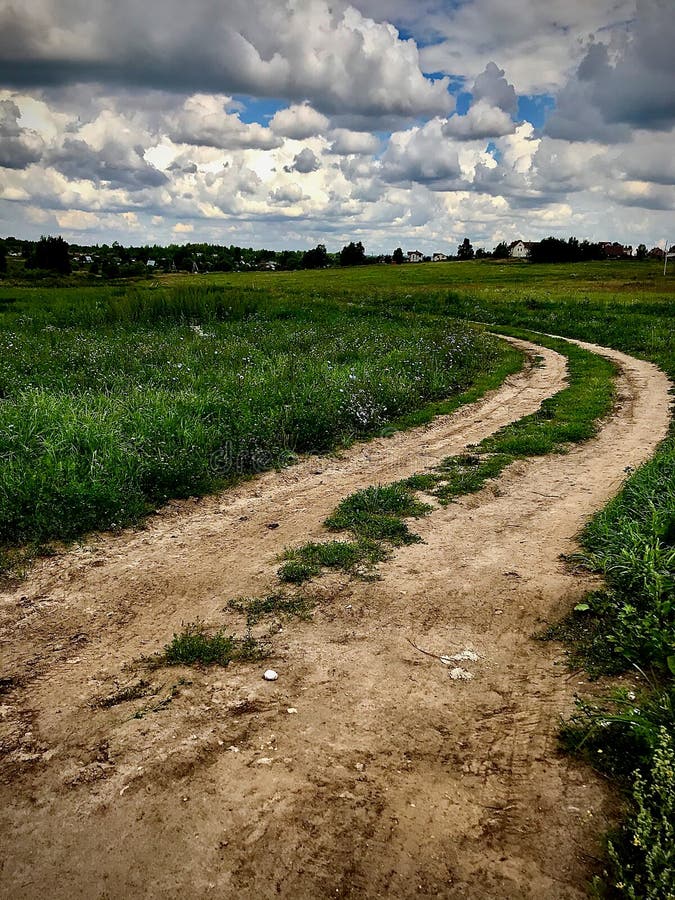 Long way stock image. Image of clouds, long, road, field - 192295567