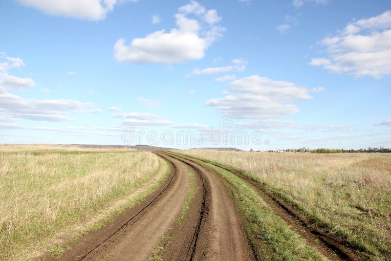 Road in field stock image. Image of blue, clouds, field - 92408617