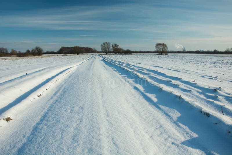 Road and Fields Covered with Snow, Horizon and Blue Sky Stock Image ...