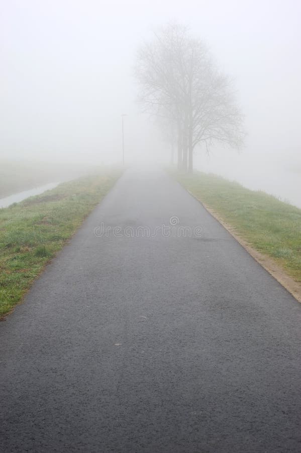 Road into the fog stock image. Image of perspective, street - 22647933