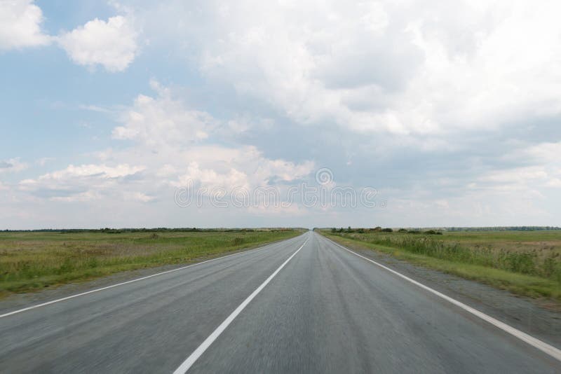 The Road Going into the Distance between Fields Stock Photo - Image of ...