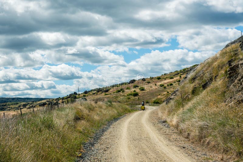 Road Going Over the Mountain Under a Clouded Sky Stock Image - Image of ...