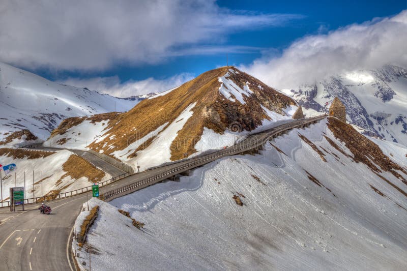 Road Going Up Next To a Mountain Stock Photo - Image of peak, scenery ...