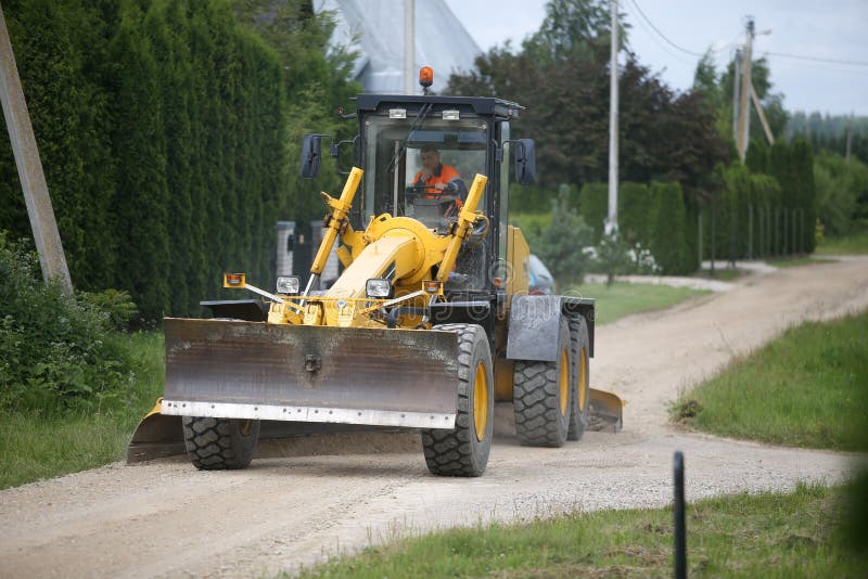 Road Grader Bulldozer, Leveling the Settlements on the Road Editorial ...