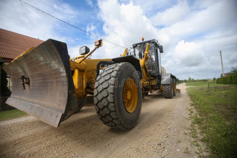 Road Grader Bulldozer, Leveling the Settlements on the Road Editorial ...