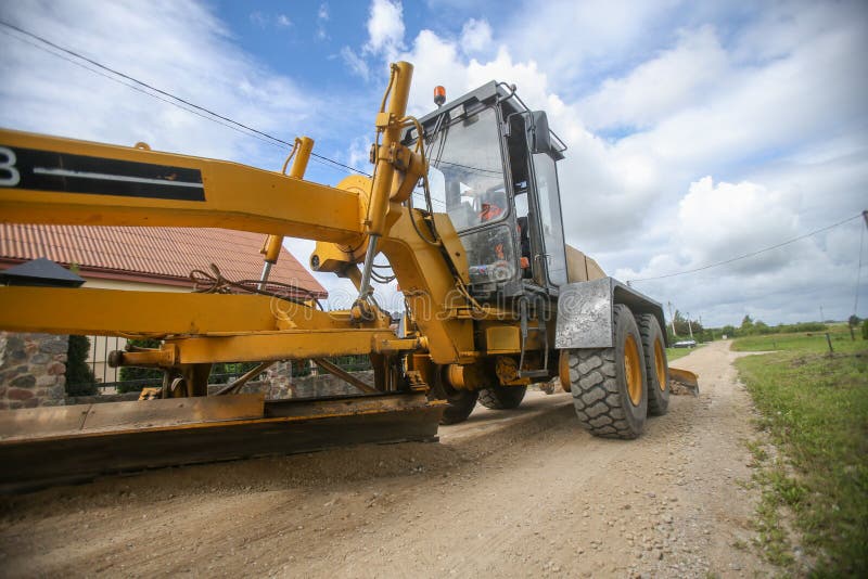 Road Grader Bulldozer, Leveling the Settlements on the Road Editorial ...