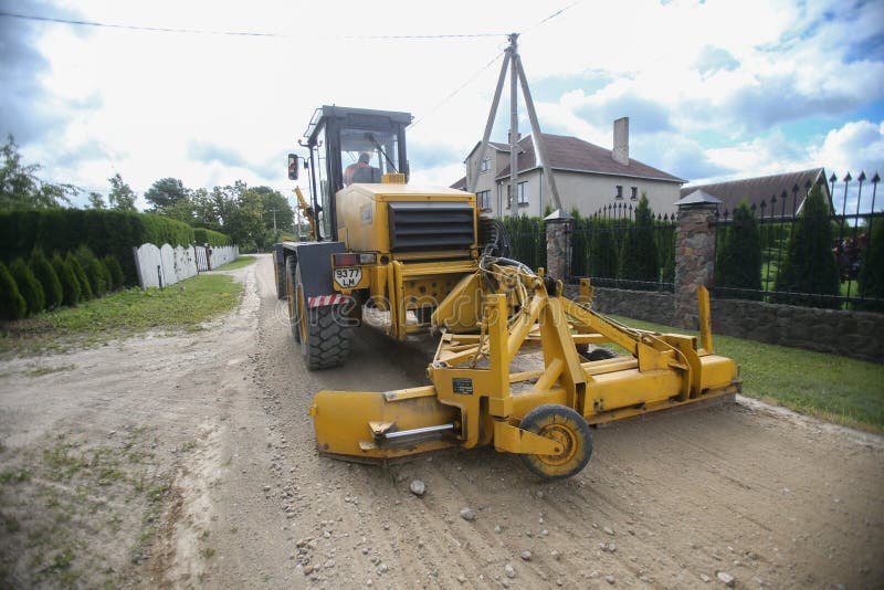 Road Grader Bulldozer, Leveling the Settlements on the Road Editorial ...
