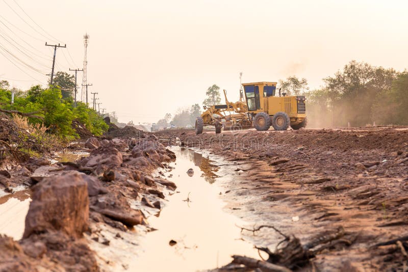 Road Grader Tractor Working at Road Construction Site, Motor Grader ...