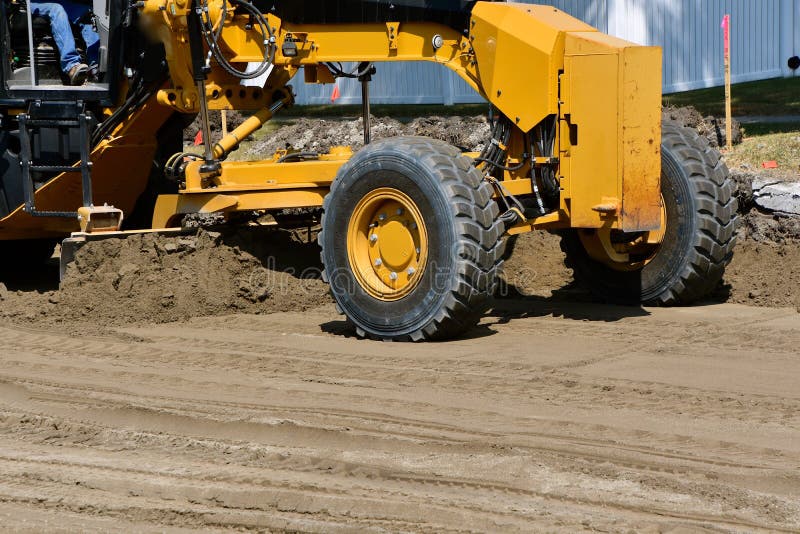Road Graders Levels Sand in a Road Construction Project Stock Image ...