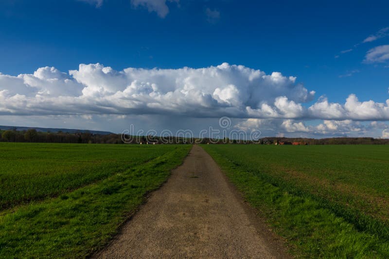 The Road, Grass Field and Blue Sky Stock Image - Image of blue, green ...