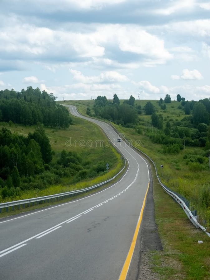 Road among Grassed Fields. Picturesque Countryside Stock Image - Image ...