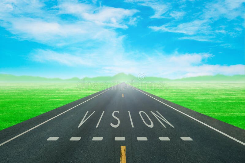 Road through the Green Field with Sign Vision on Asphalt Stock Photo ...