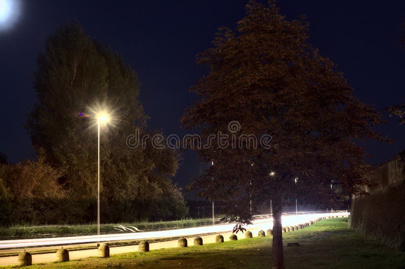 Road in an Italian Town at Night Stock Photo - Image of cloudy, cidades ...