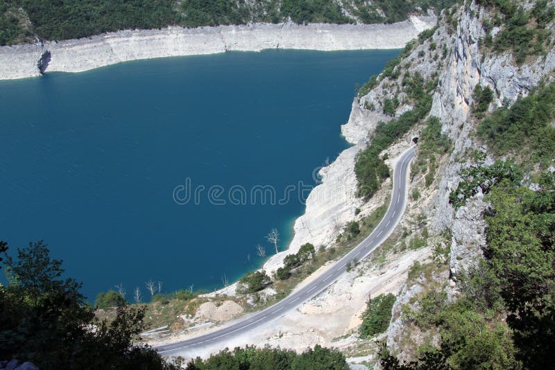 Road and lake stock image. Image of mountain, tourism - 26432529