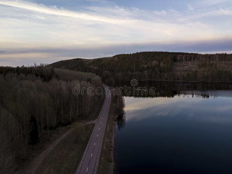 Road by lake stock image. Image of transportation, scenery - 145783421