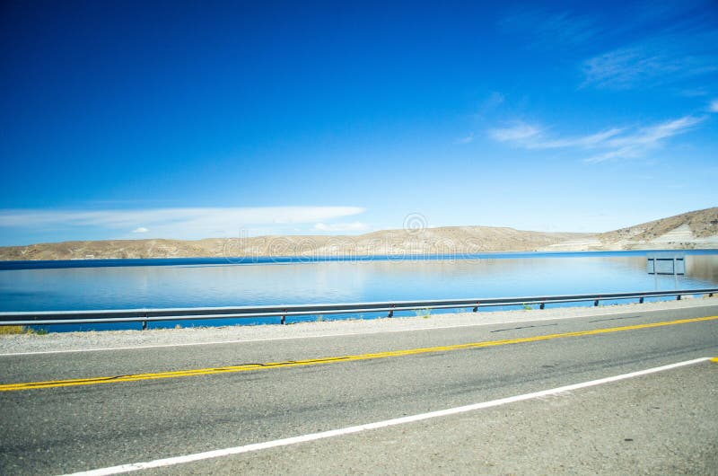 Road and Lake stock image. Image of highway, calm, freedom - 68123733