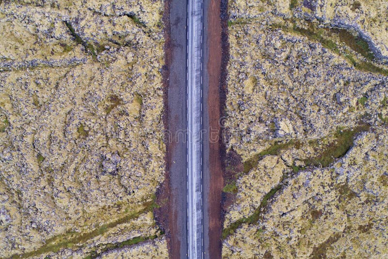 Road through the lava stock image. Image of aerial, rocky - 96632953