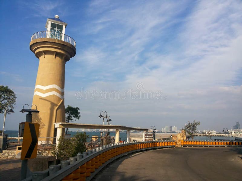 Road and Lighthouse by the Sea Stock Image - Image of barriers ...