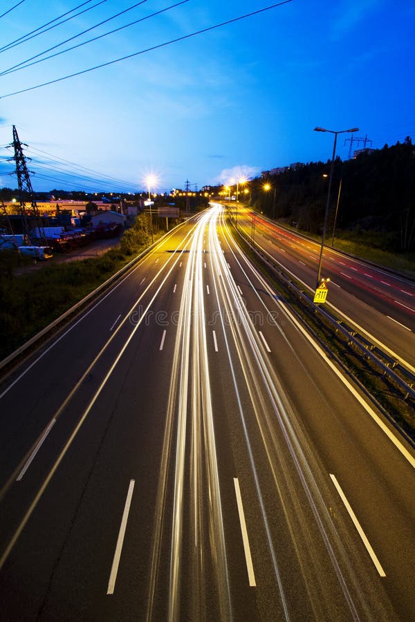 Road, lights and sky 2 stock image. Image of jammed, headlight - 20878183