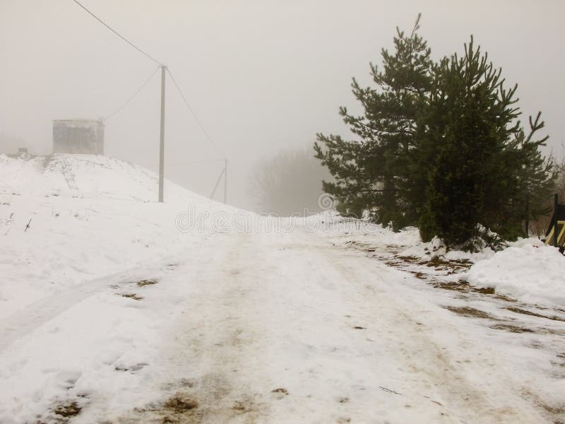 Road in Lithuania Leading To Nowhere Stock Photo - Image of snow, mist ...