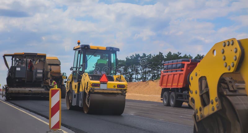 Road Machinery on the Construction of a Road Stock Photo - Image of ...