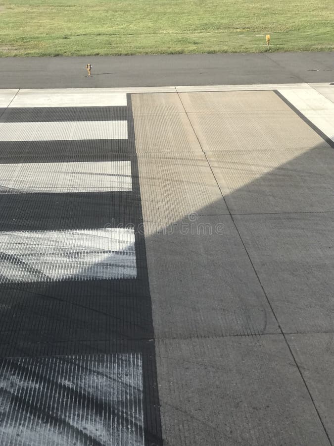 Road Marking on the Airport Runway Stock Image - Image of industry ...
