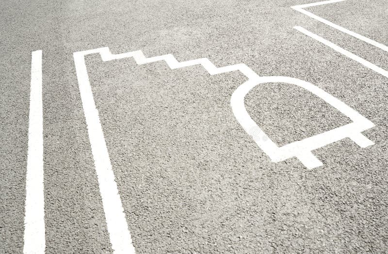 Road Marking for Electric Car Charging Point in Car Park Stock Photo ...