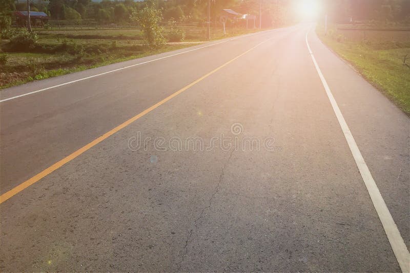The Road on the Morning Sun with the Rice Fields beside the Road Stock ...