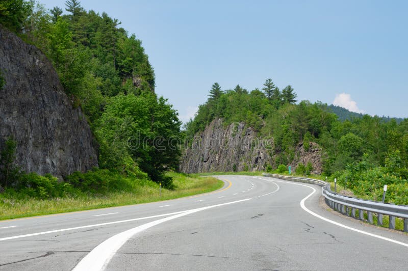 Highway Cut Into Hills stock photo. Image of carved, boondocks - 21288222