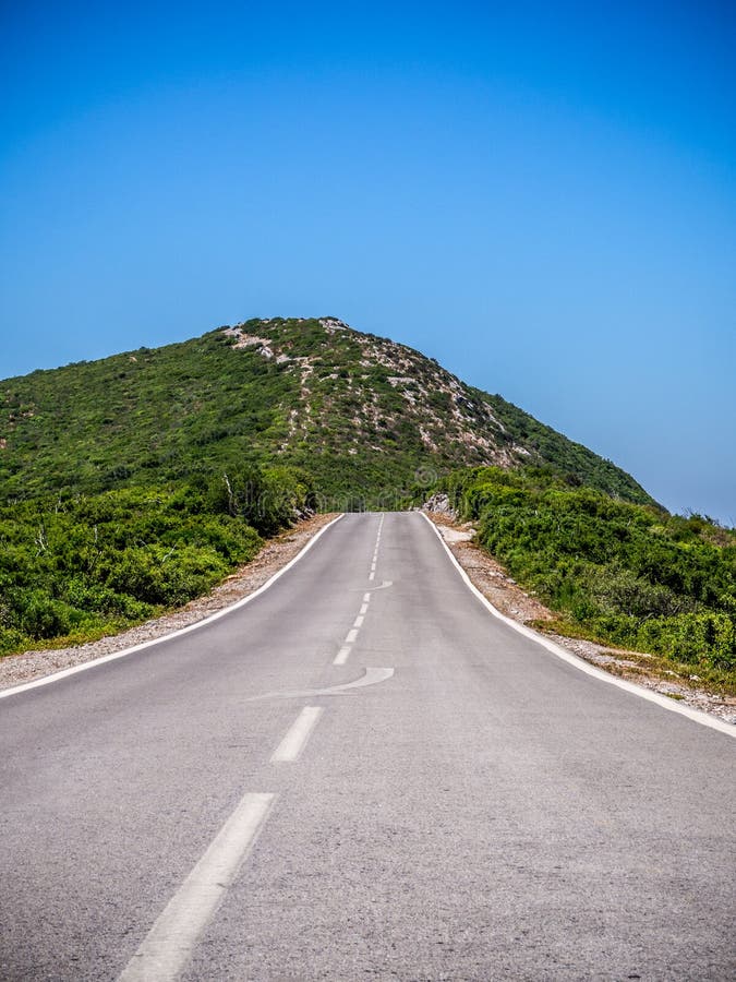Road at mountain range stock photo. Image of landscape - 88199884