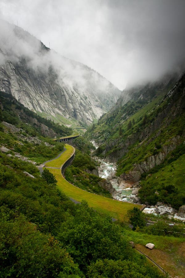 Road through mountains stock image. Image of traveling - 16039523