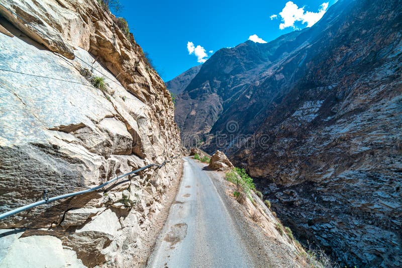 A Road in the Mountains Carved in the Rock Stock Image - Image of path ...