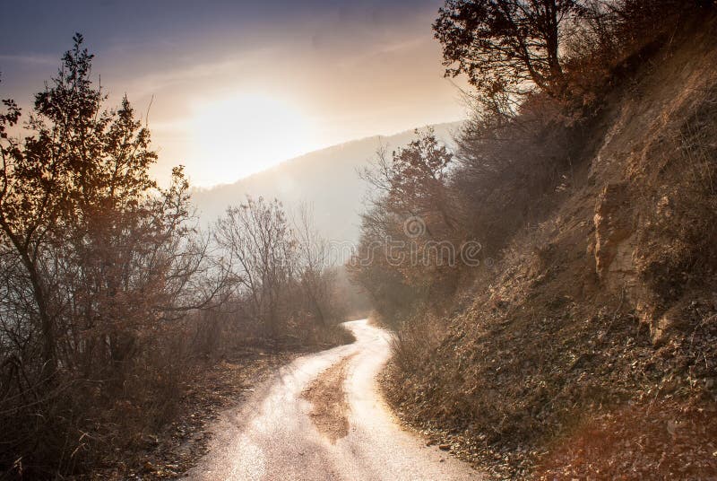 Road in Mountains Going Down Stock Image - Image of mountains, village ...