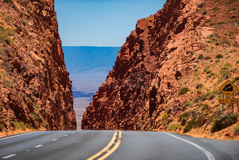 Road in Mountains. Road Leading Towards a Rocky Mountain. Stock Photo ...