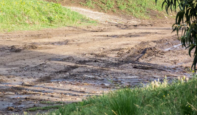 Road of mud with tracks stock image. Image of road, landscape - 152900511