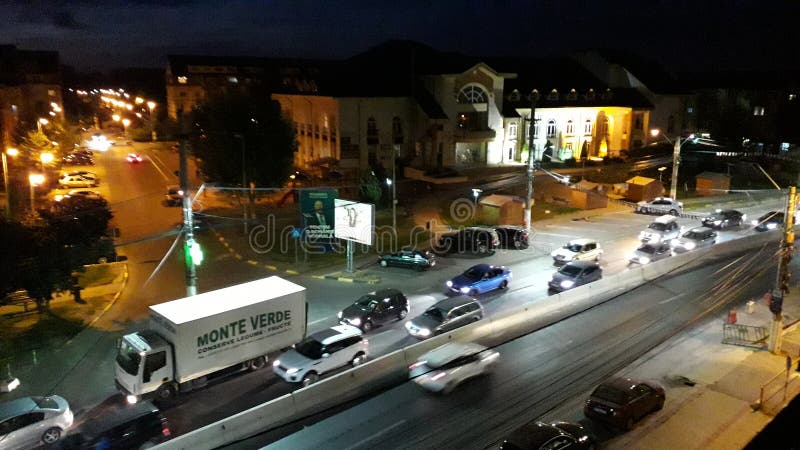 A road at night with cars editorial photo. Image of road - 160114101