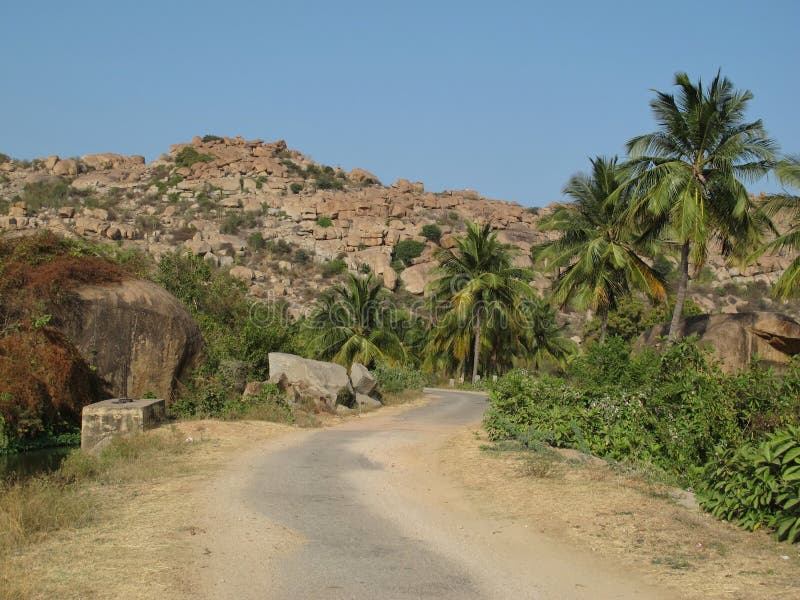 Road, Palms and Granite Mountain Stock Image - Image of stone, nature ...