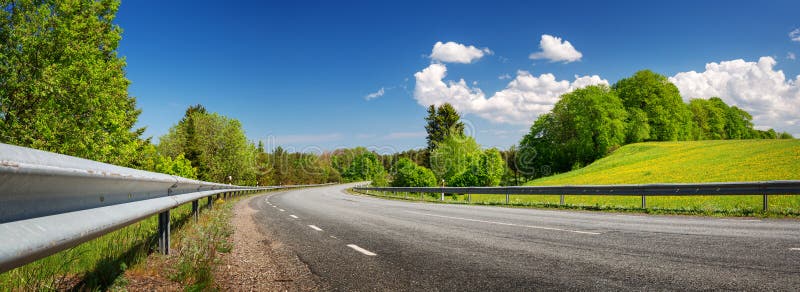 Road Panorama on Sunny Spring Day Stock Image - Image of flowers, land ...