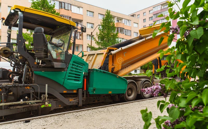 Road Paving Machine Stacking Asphalt Stock Photo - Image of ...