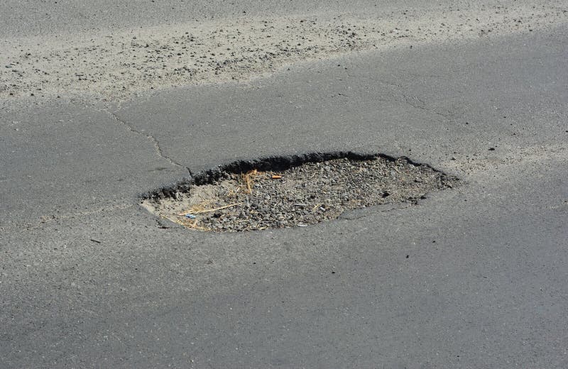 Road Pit. Close Up on Asphalt Road Pothole Need To Repair Stock Image ...