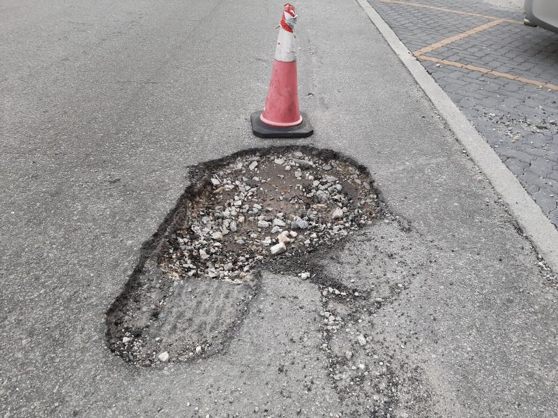 Road Potholes stock image. Image of pedestrian, asphalt - 233909245