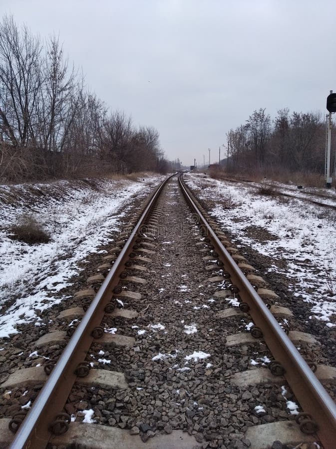 Road on Rails Going into the Distance in Cold Winter Stock Image ...